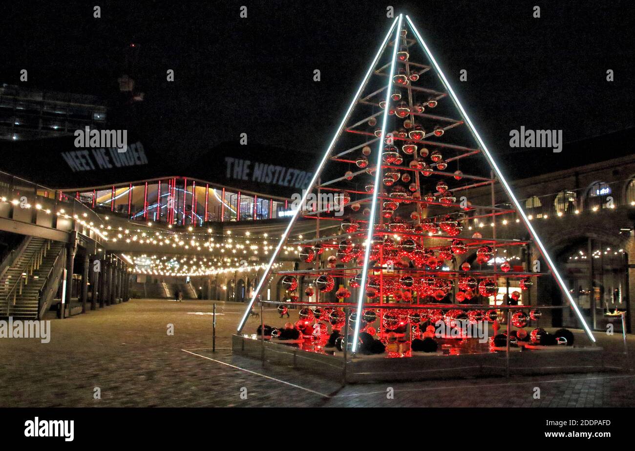 The Terrarium Tree lit at night in Coal Drops Yard.King's Cross, London ...