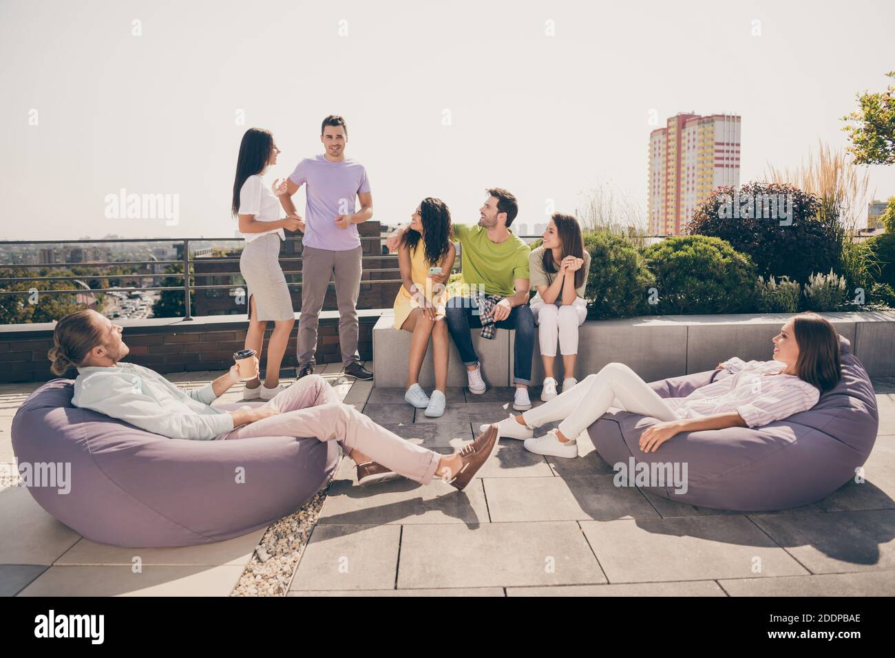 Full body photo of crowd of positive friends communicating tell to each ...