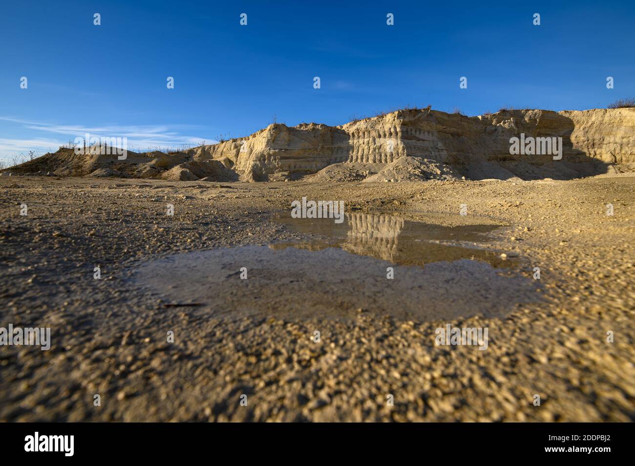 Man made limestone cliffs at limestone quarry Stock Photo - Alamy