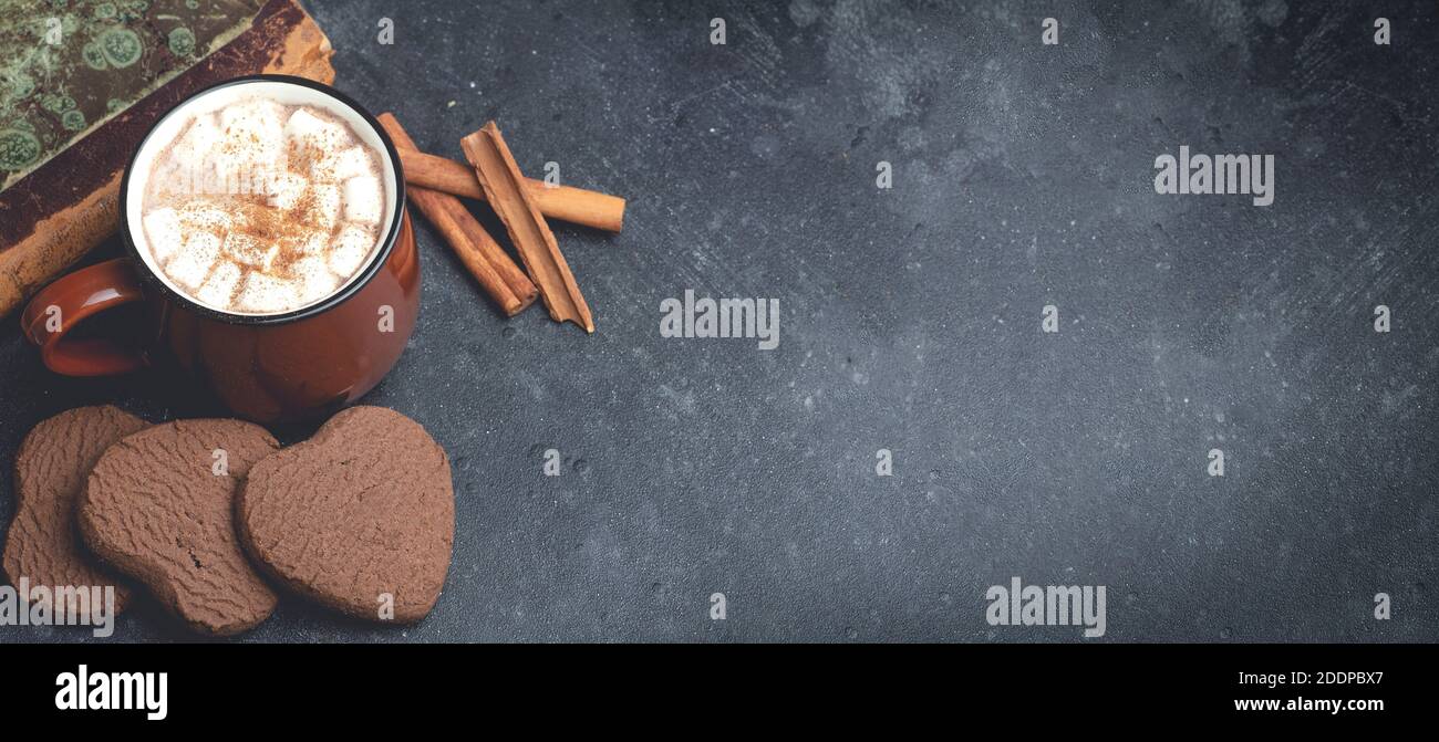 Hot chocolate (cocoa) drink banner backround. Cocoa drink on a dark ...