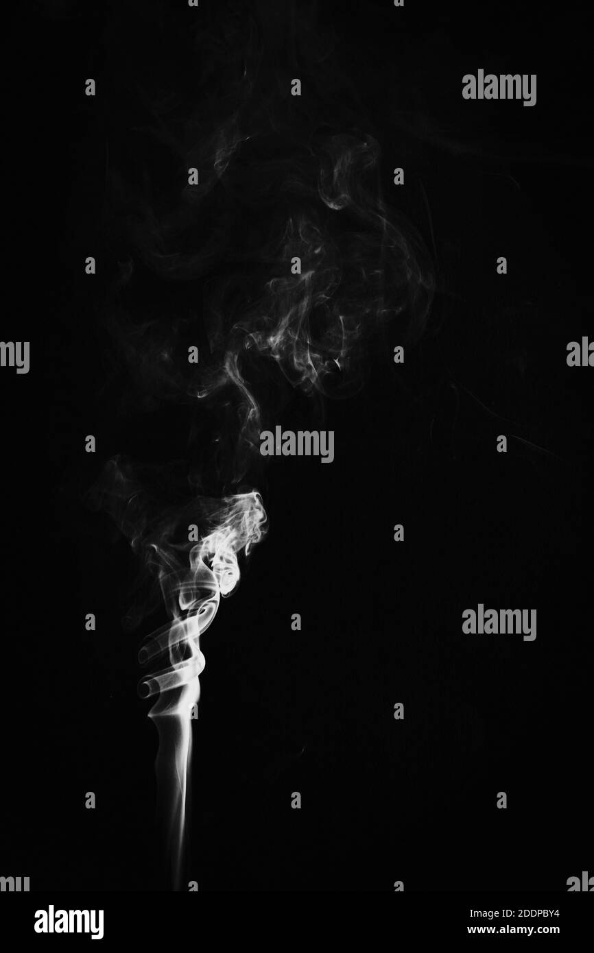 Trail of the smoke on a black paper Stock Photo - Alamy