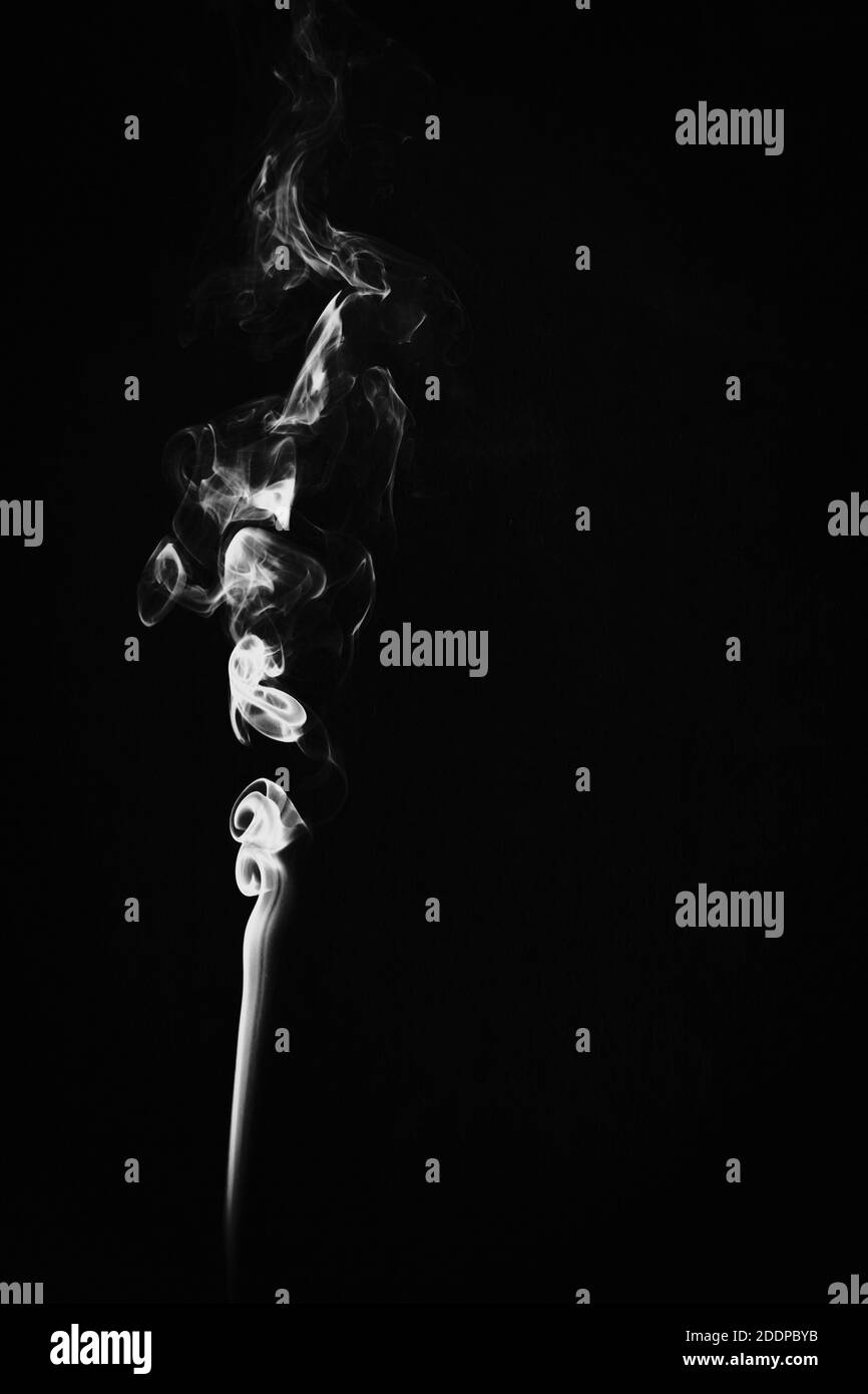 Trail of the smoke on a black paper Stock Photo - Alamy
