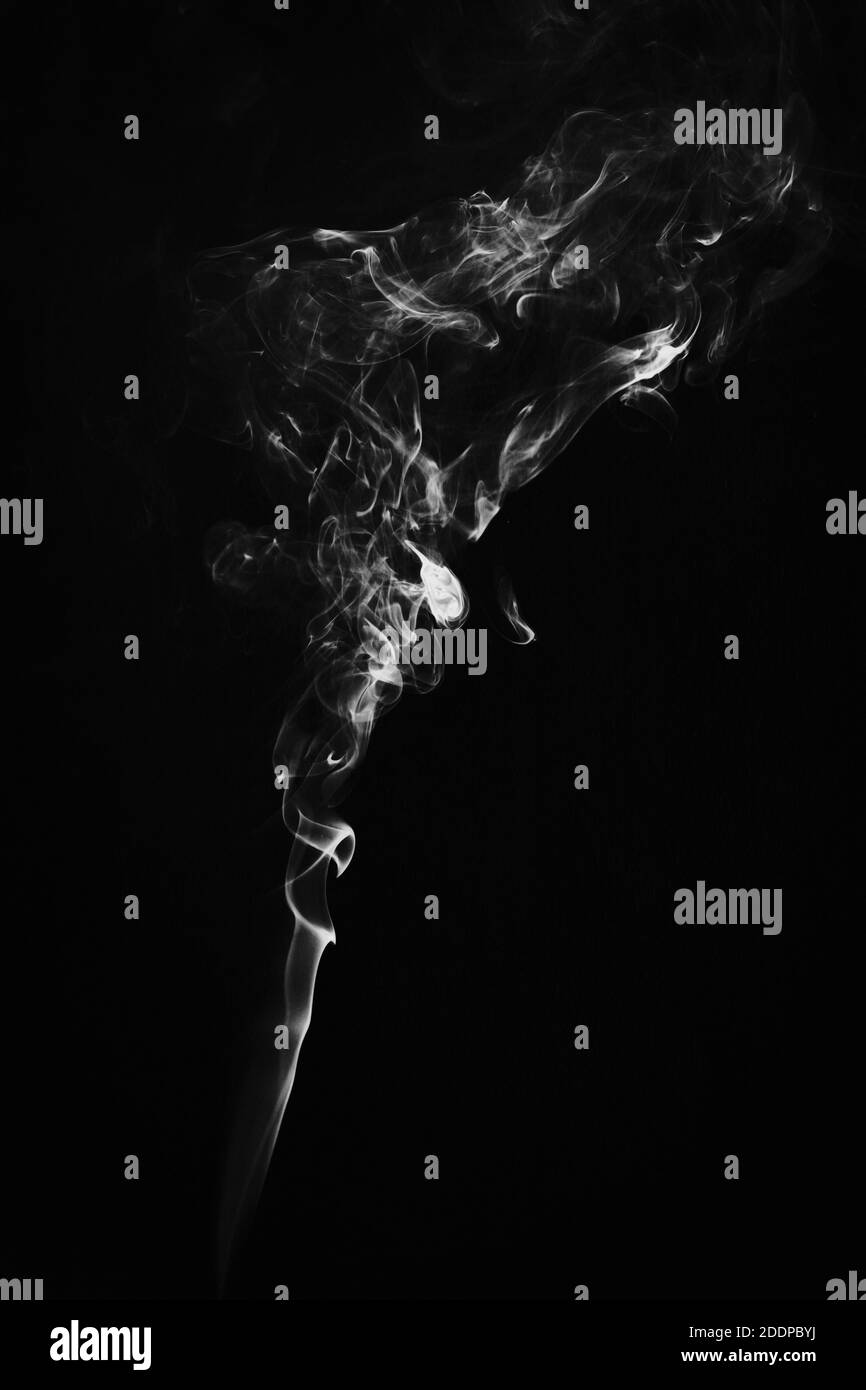 Trail of the smoke on a black paper Stock Photo - Alamy