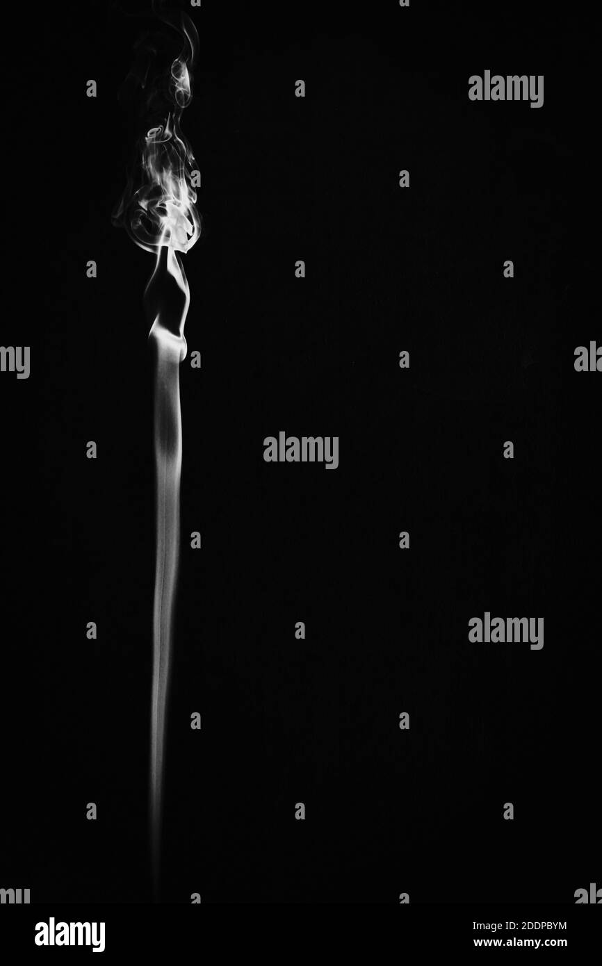 Trail of the smoke on a black paper Stock Photo - Alamy