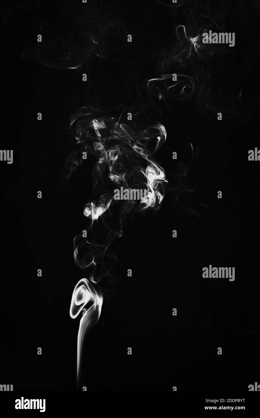 Trail of the smoke on a black paper Stock Photo - Alamy