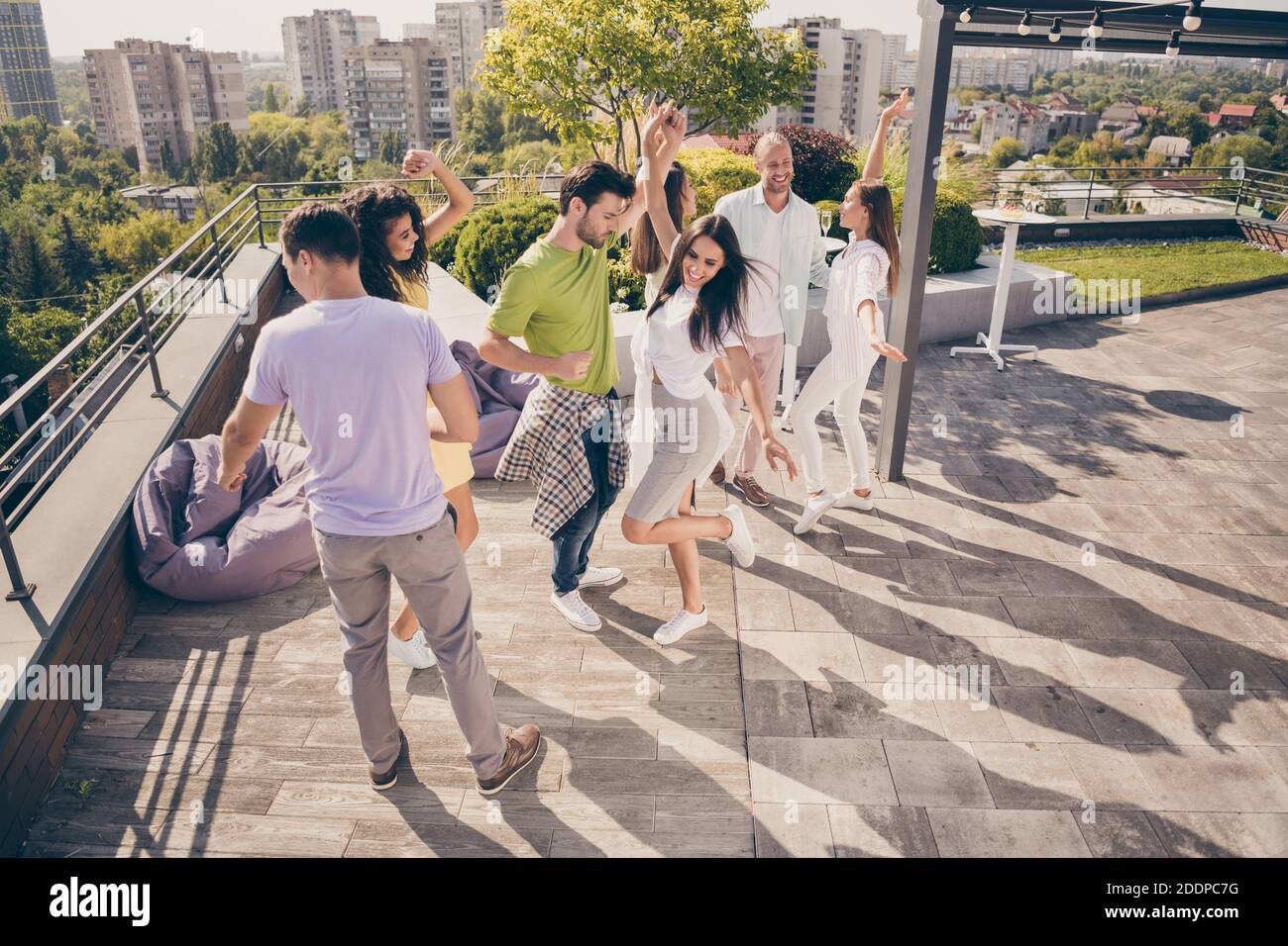 Photo of adorable pretty girls handsome guys have fun dancing party on ...