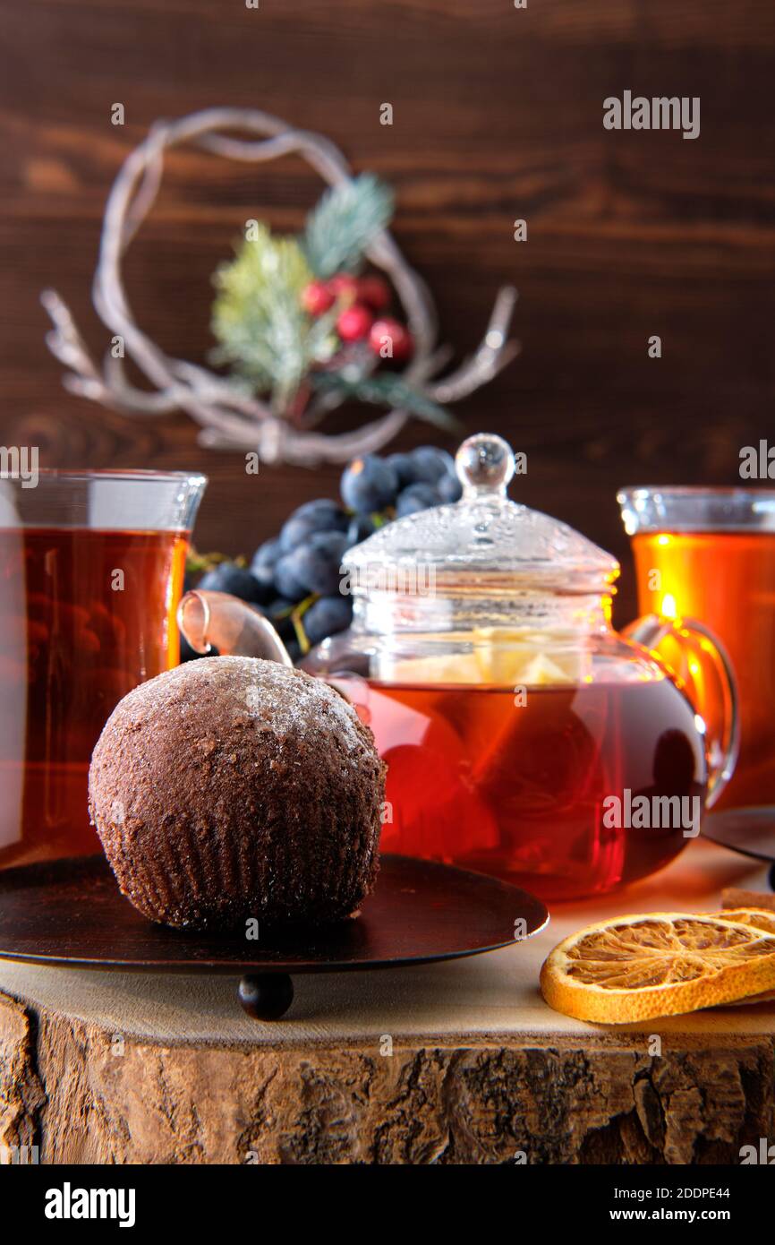 Christmas tea - grape and lemon tea with chocolate cake Stock Photo - Alamy