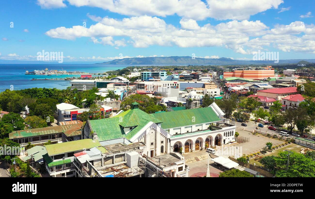 The modern city of Tagbilaran with a seaport and buildings. The capital ...