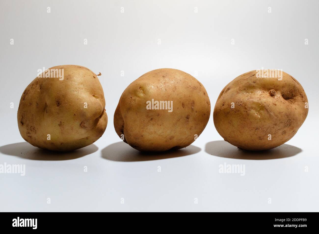 Three potatoes which hi-res stock photography and images - Alamy