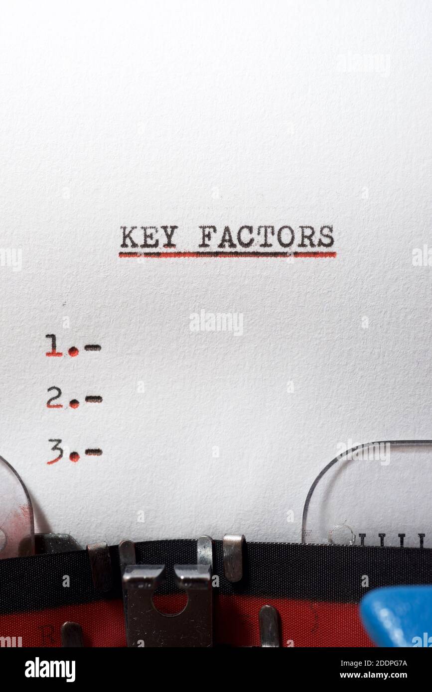 Key factors phrase written with a typewriter Stock Photo - Alamy