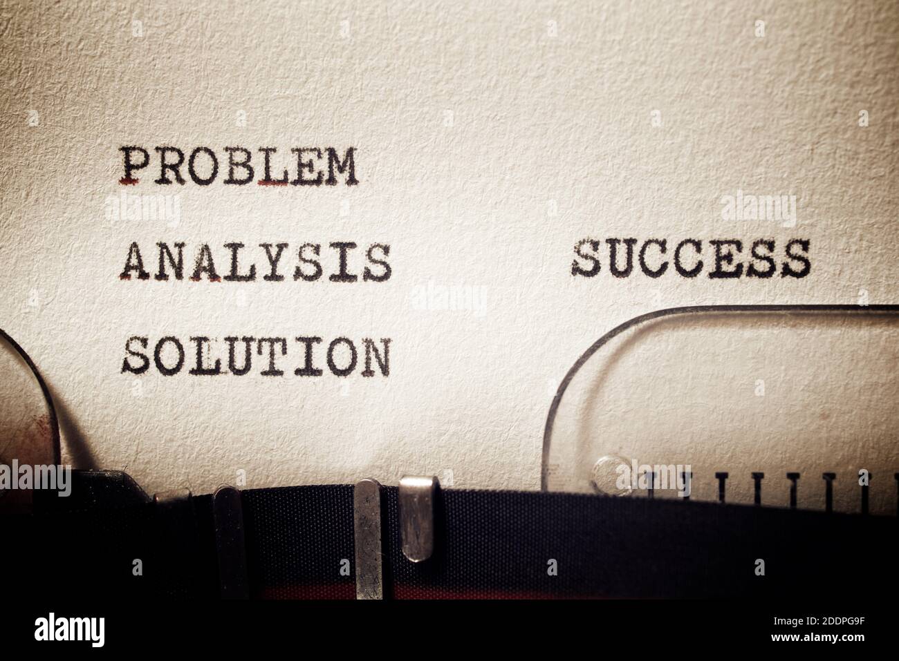 Problem analysis solution and success words written with a typewriter ...