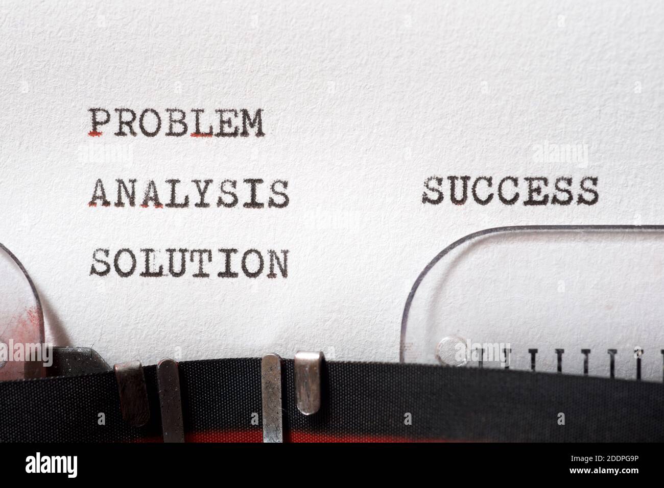 Problem analysis solution and success words written with a typewriter ...