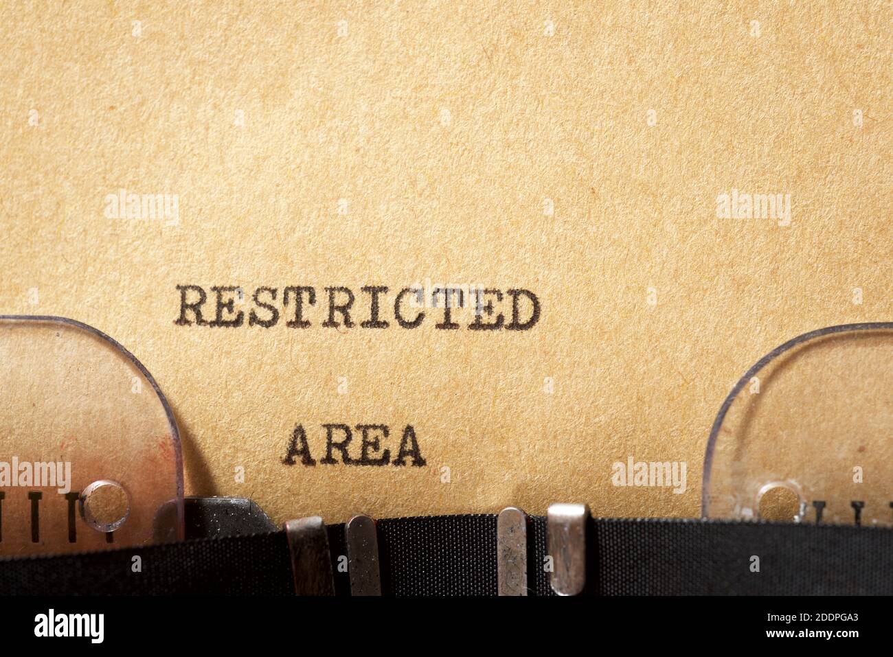 Restricted area phrase written with a typewriter Stock Photo - Alamy