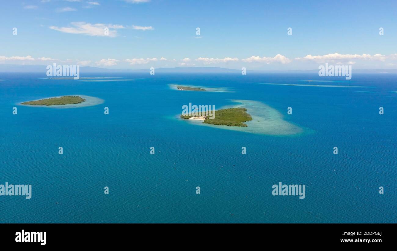 Aerial seascape: Tropical Islands and blue sea against the sky with ...