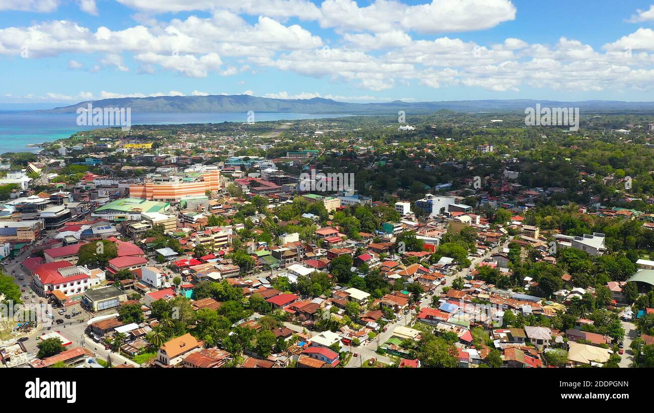 Aerial drone of city of Tagbilaran near the sea on the island of Bohol ...