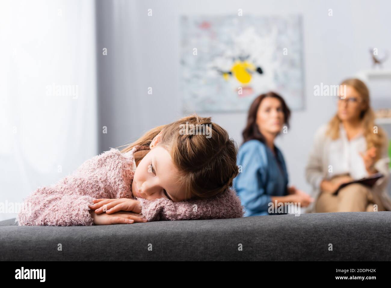 Doctor talking child sad hi-res stock photography and images - Alamy