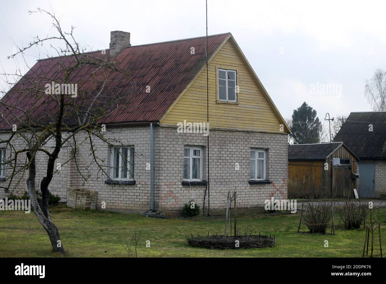 Lithuanian village. Ancient yellow wood traditional house Stock Photo ...