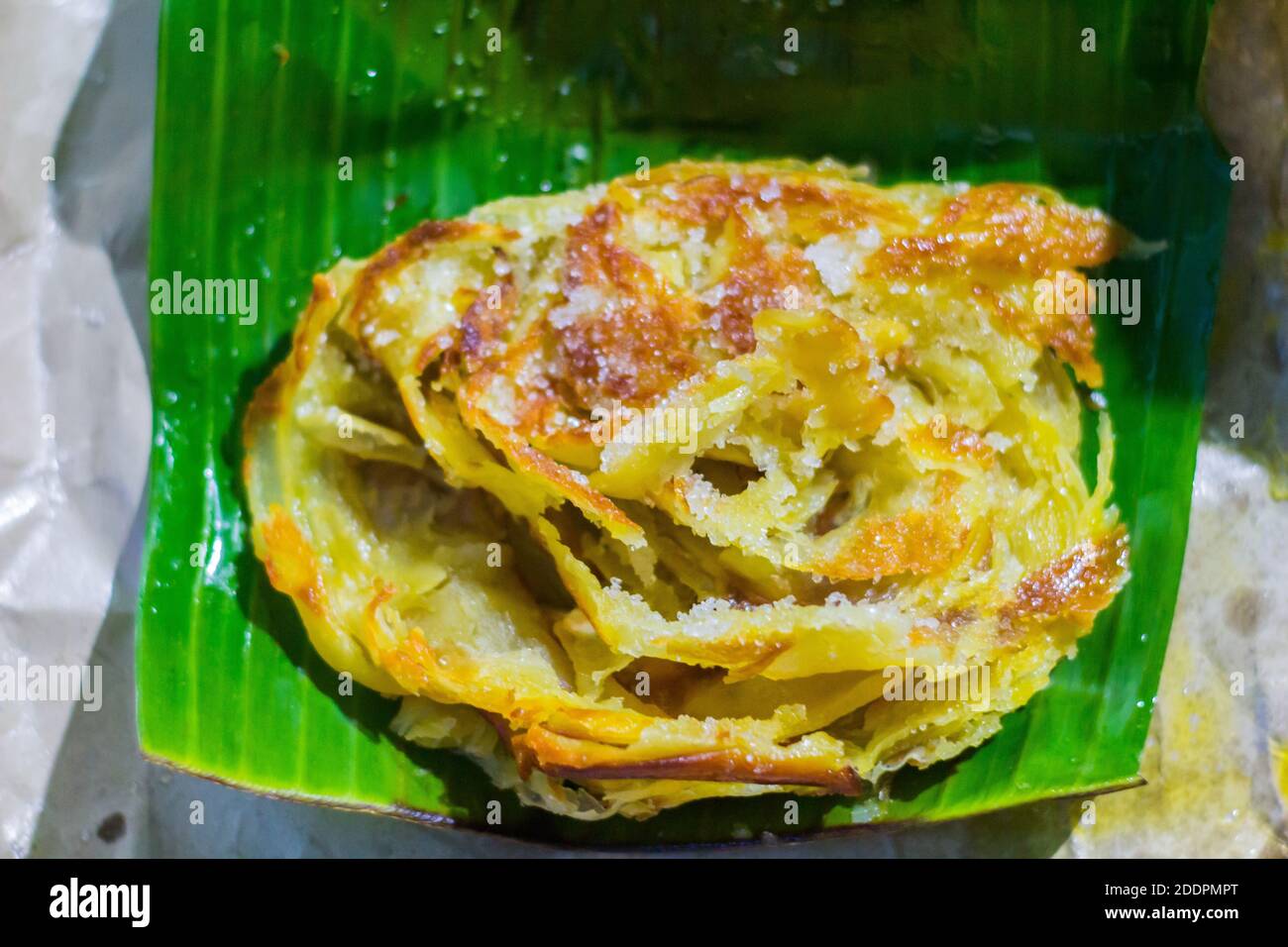 A traditional sweet roti, a type of sweet pancake at a local restaurant ...