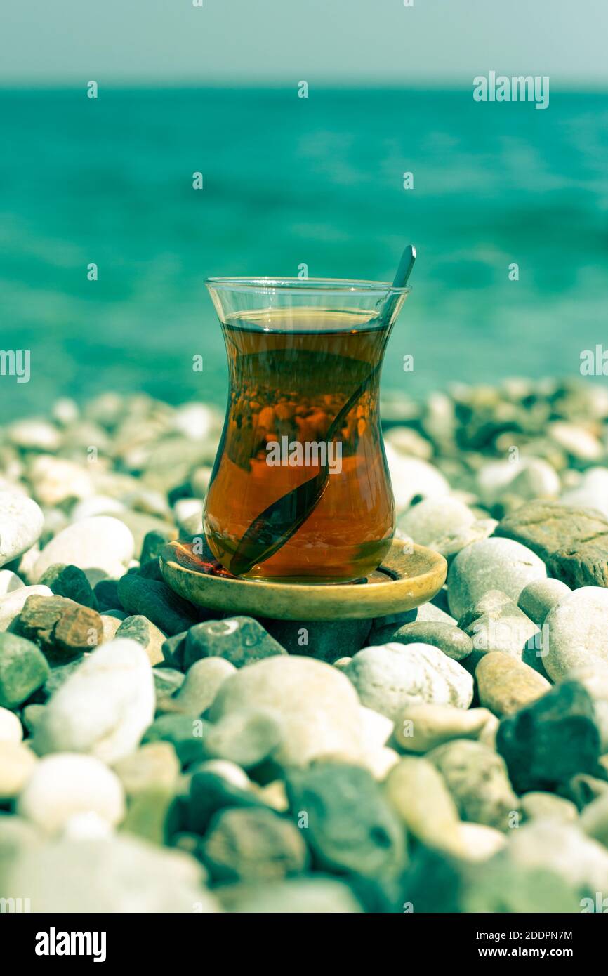 Armudu. Tea in a glass on the beach Stock Photo - Alamy