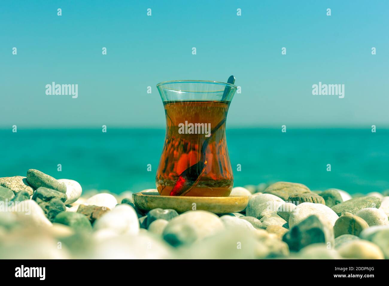 Armudu. Tea in a glass on the beach Stock Photo - Alamy