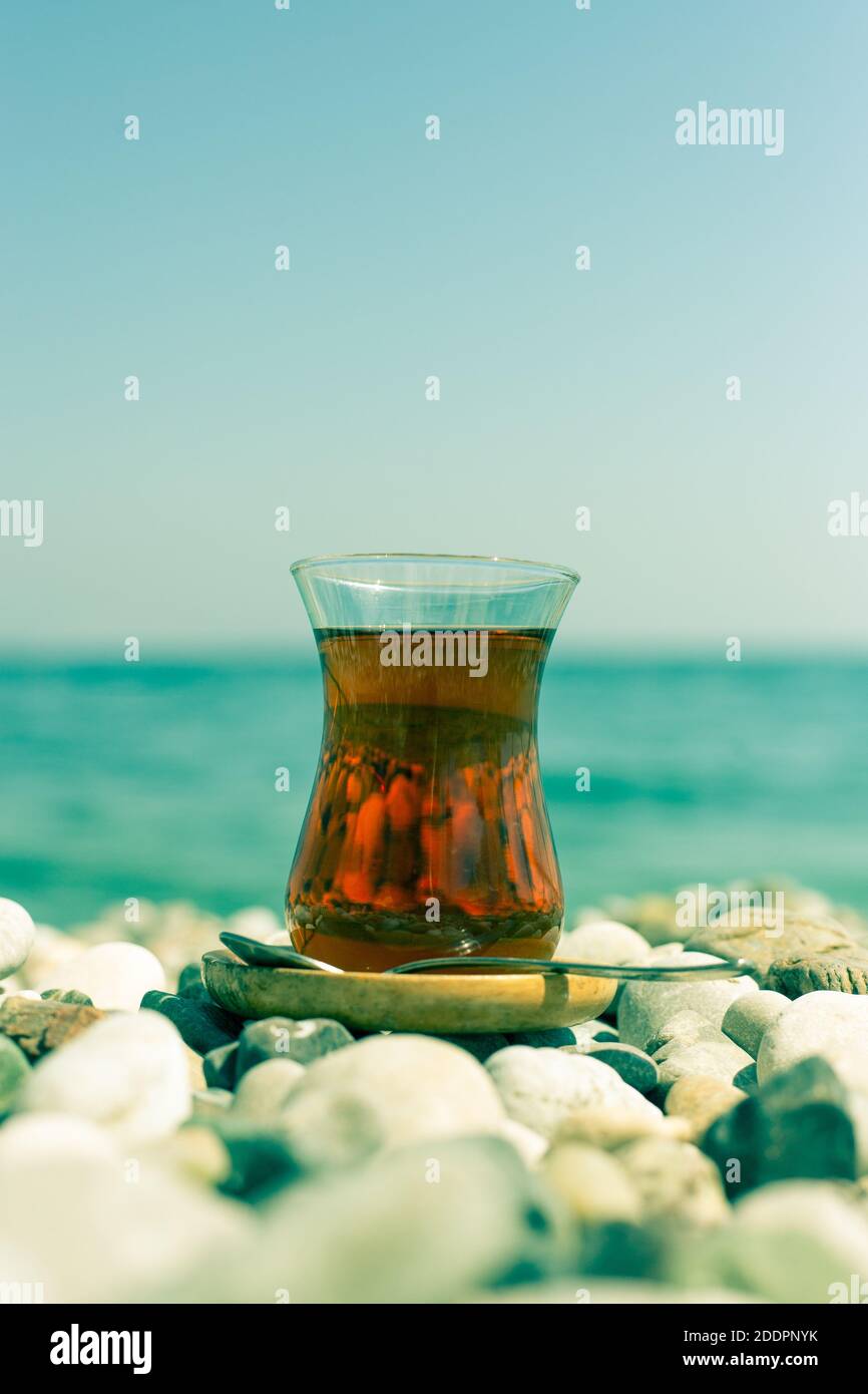 Armudu. Tea in a glass on the beach Stock Photo - Alamy