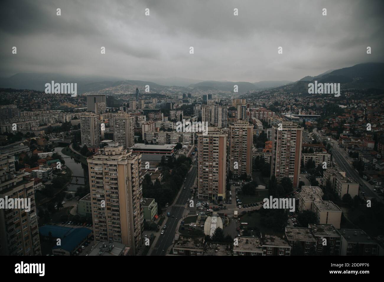 an aerial shot of the residential buildings in a city under the clouds Stock Photo - Alamy