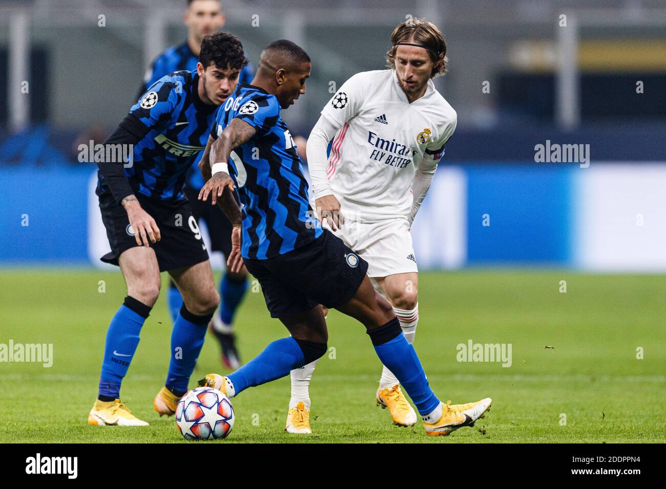 Milan, Italy. 25th Nov, 2020. Luka Modric of Real Madrid (R) dribbles ...