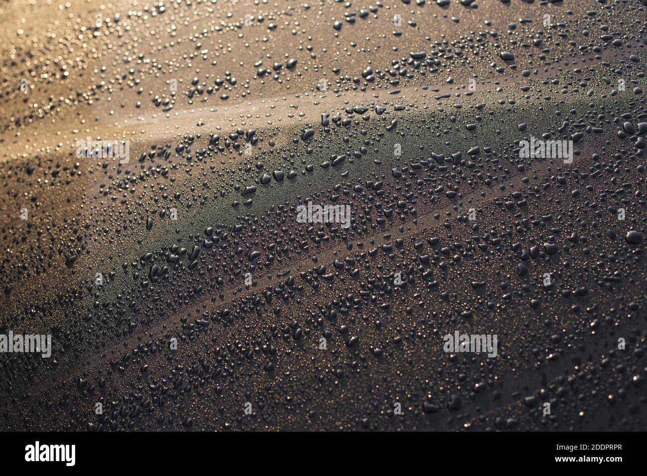 water drops on dark metal background Stock Photo - Alamy