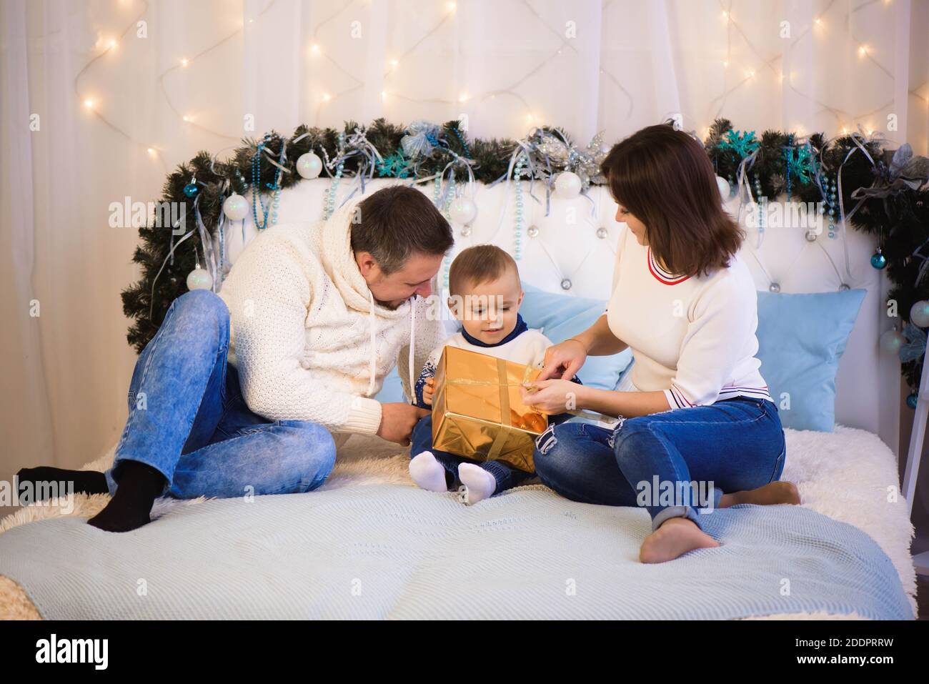 Beautiful family enjoying their holiday time together and having fun ...