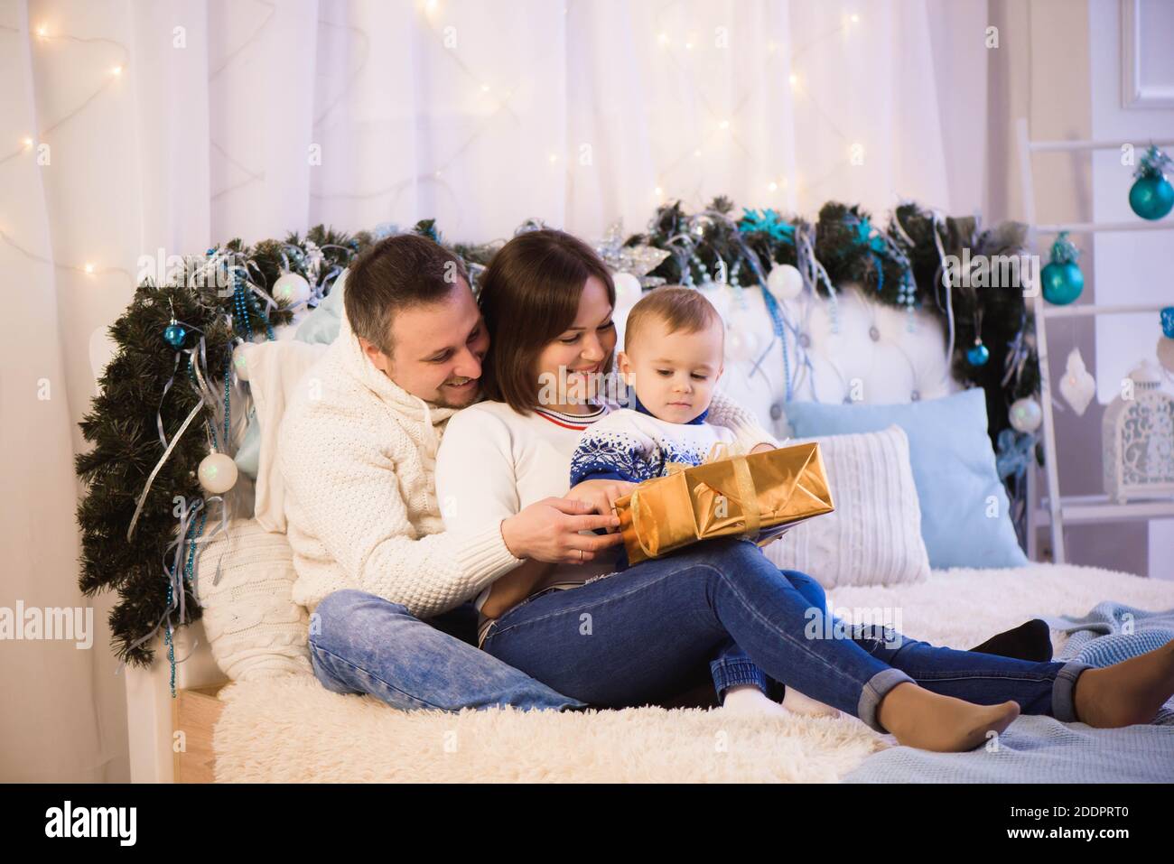 Beautiful family enjoying their holiday time together and having fun ...