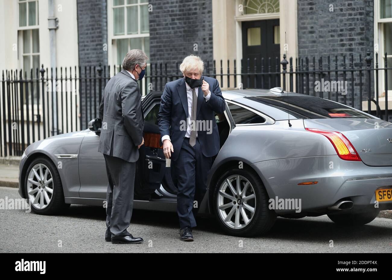 Prime Minister Boris Johnson arrives back at 10 Downing Street, London ...