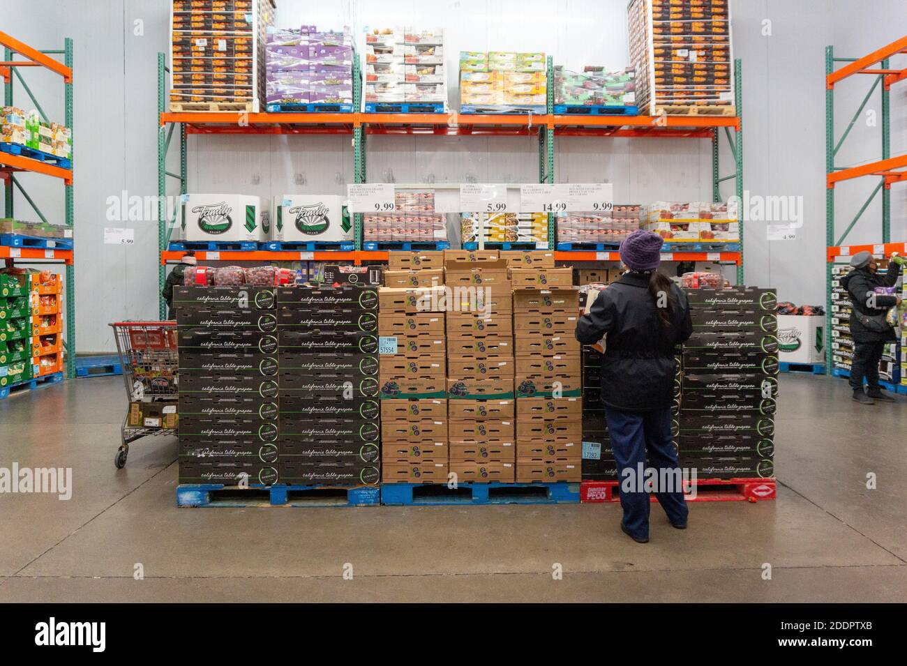 People inside the fruit refrigerated area in a Costco wholesale ...