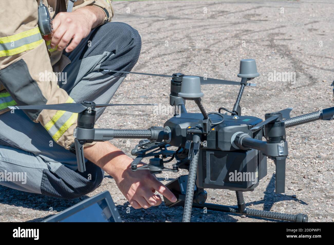 A firefighter flying a rescue drone Stock Photo - Alamy