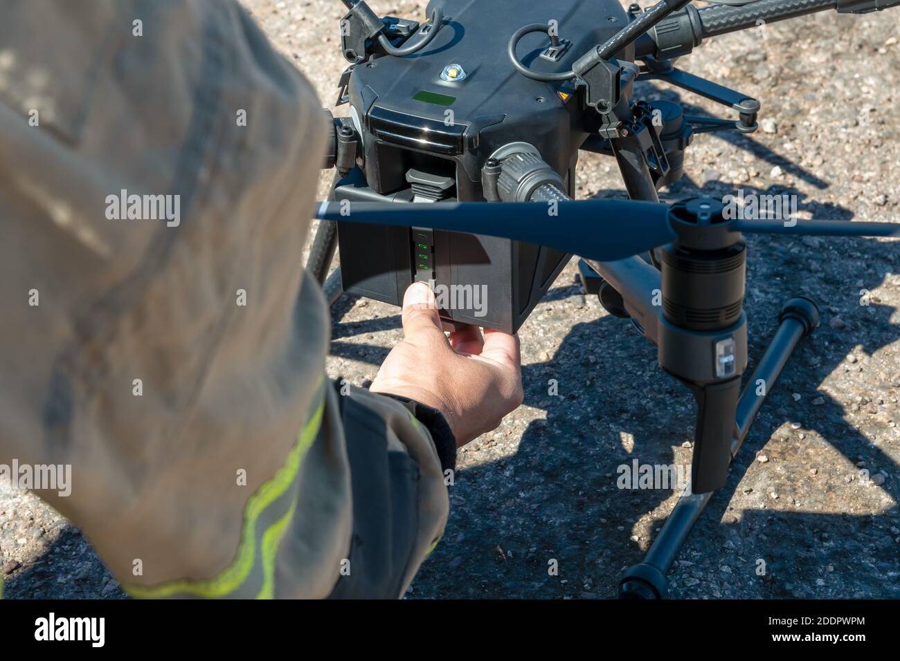 A firefighter flying a rescue drone Stock Photo - Alamy