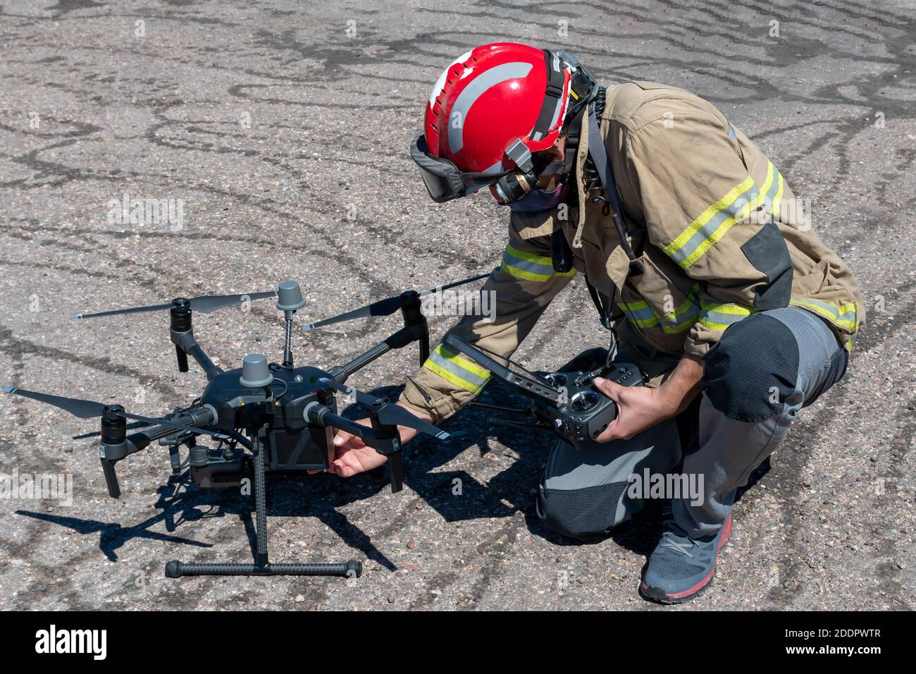 A firefighter flying a rescue drone Stock Photo - Alamy
