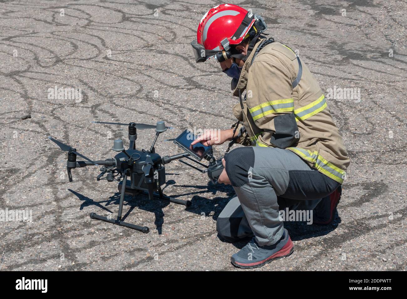 A firefighter flying a rescue drone Stock Photo - Alamy