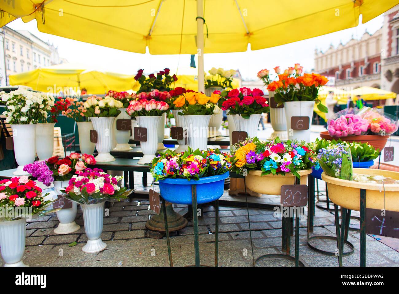 Street flower shop. Flowers in vases on the street Stock Photo - Alamy