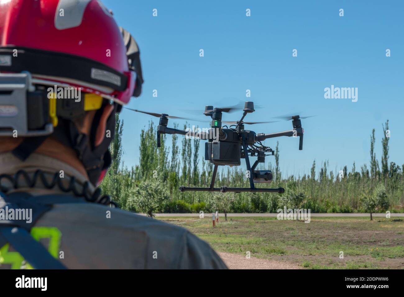 A firefighter flying a rescue drone Stock Photo - Alamy