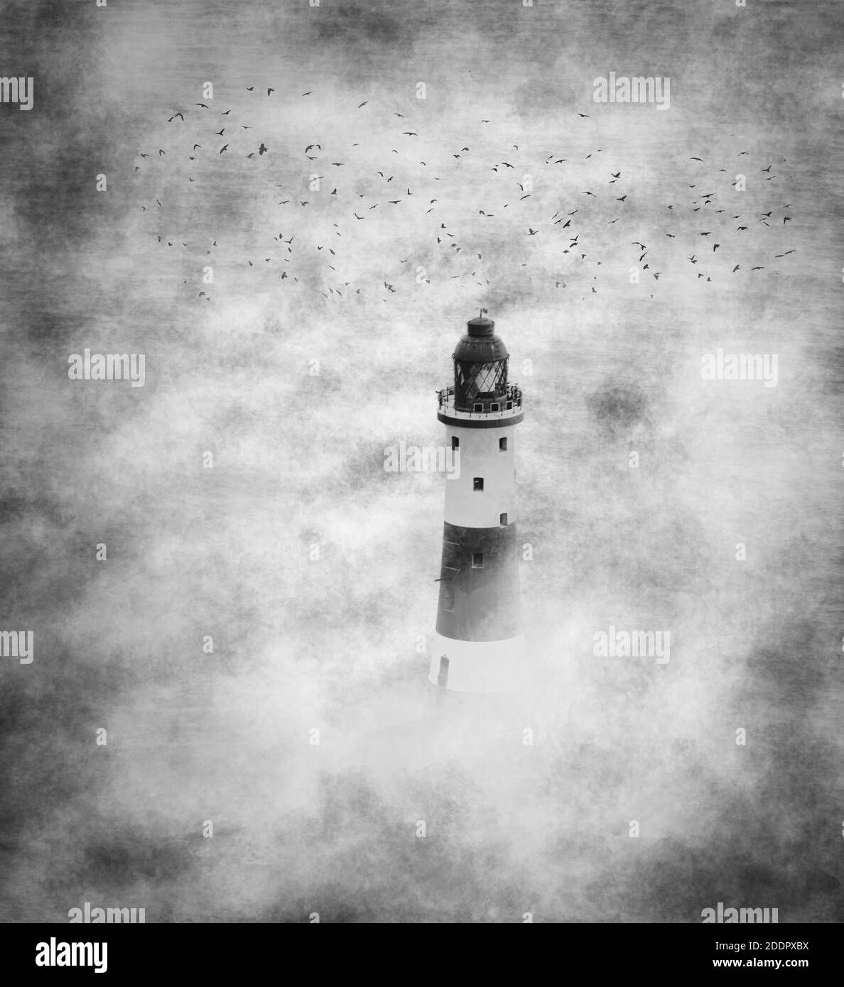 lighthouse surrounded by fog in black and white Stock Photo - Alamy