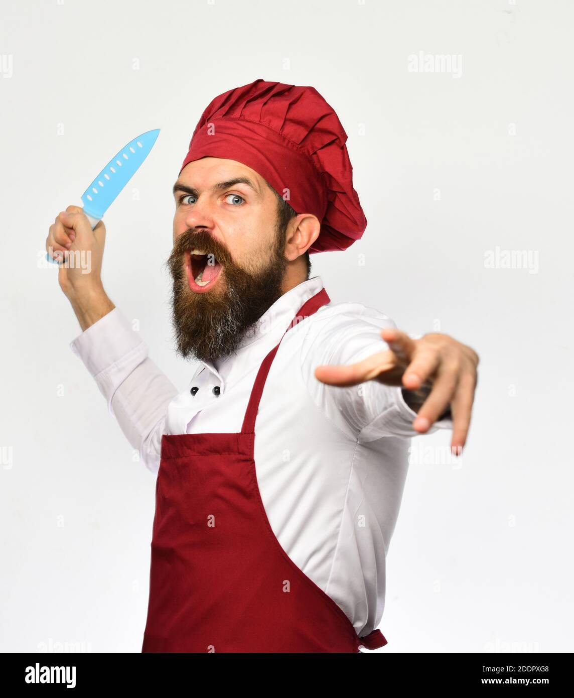 Chef pretends to throw sharp blue knife. Cooking and professional ...