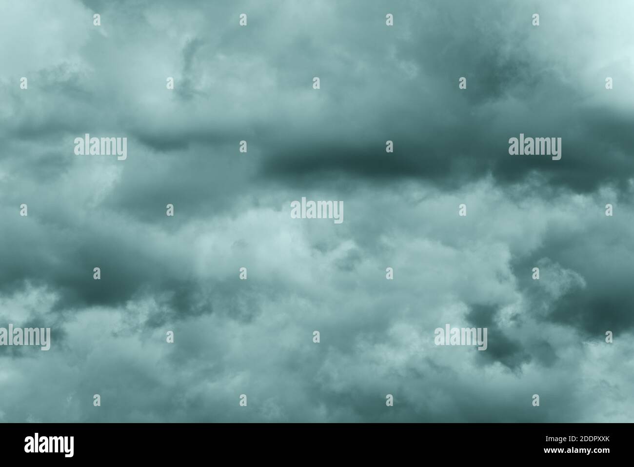 Dramatic storm clouds in rainy weather in sky, coloring in trend ...