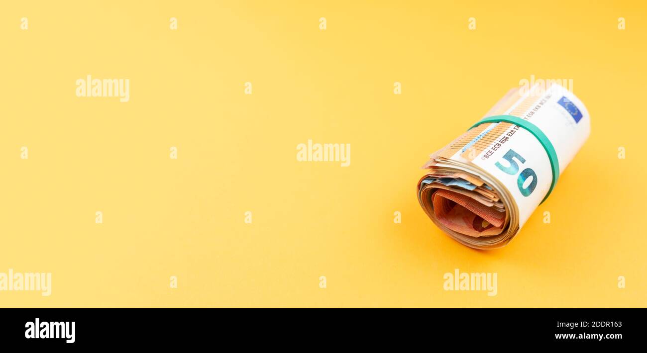 Money roll hi-res stock photography and images - Alamy