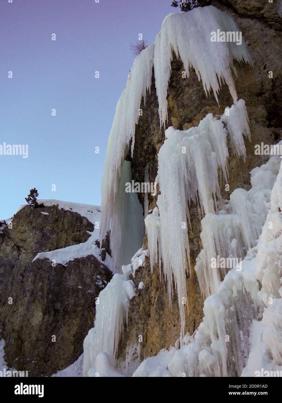 A frozen mountain icefall in a mountain gorge Stock Photo - Alamy