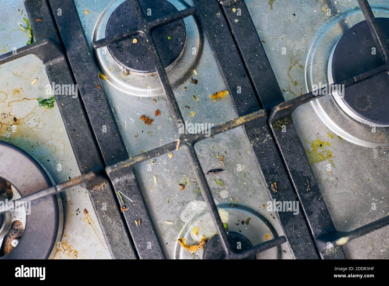 Dirty stove top with oil splatters, fat stains and food leftovers ...