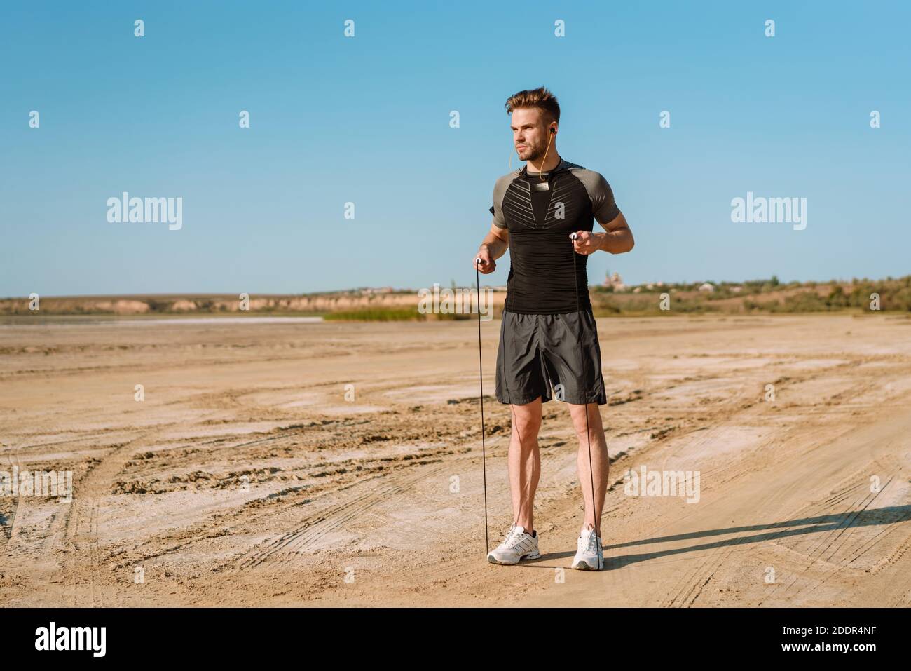 Man jumping rope and beach hi-res stock photography and images - Alamy