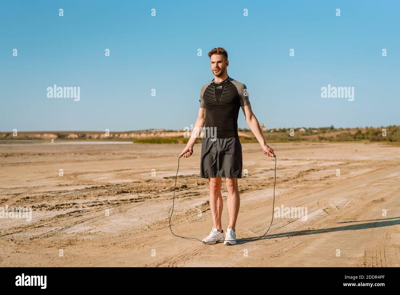 Man jumping rope and beach hi-res stock photography and images - Alamy