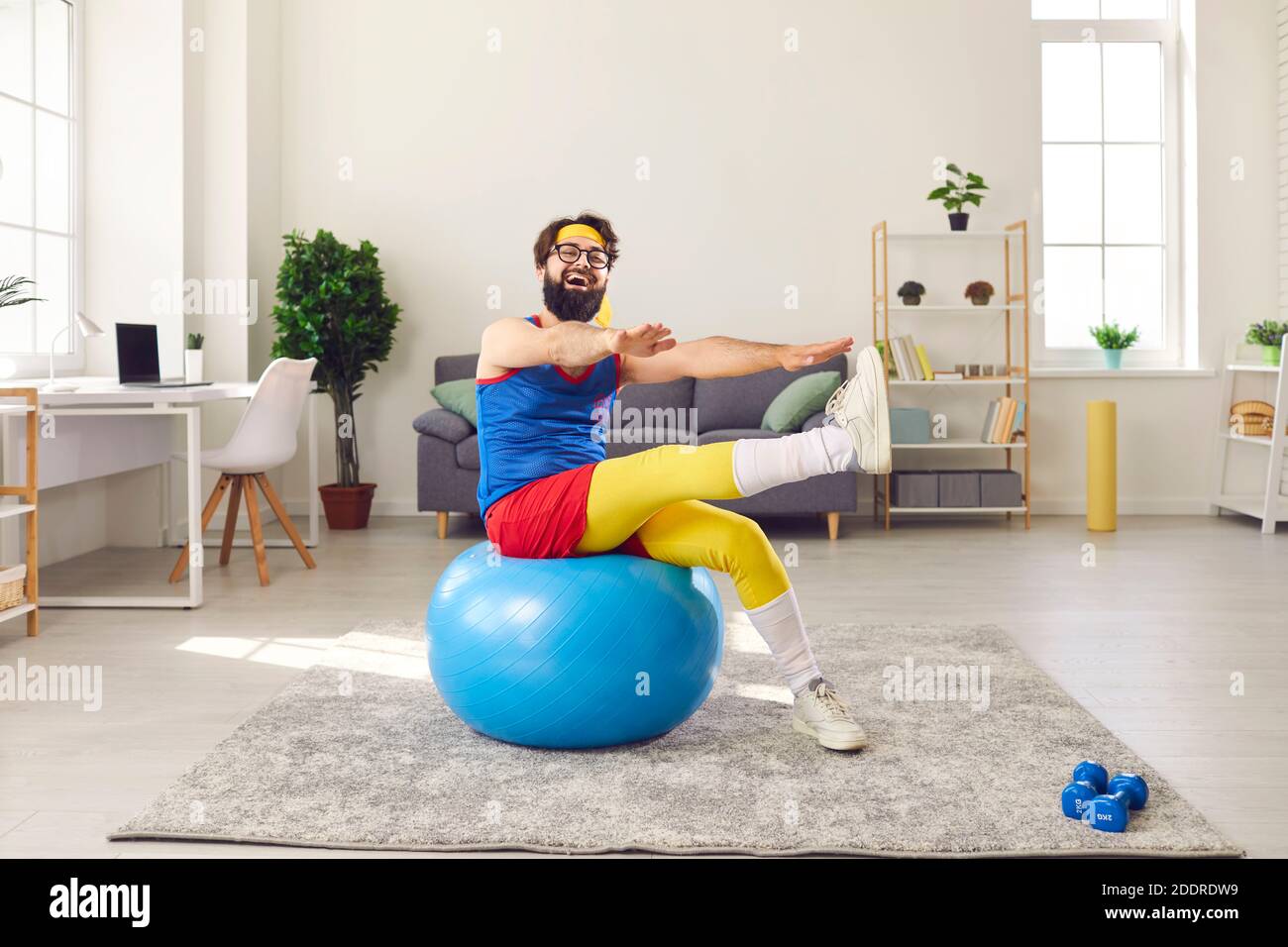 Man sitting on exercise ball hi-res stock photography and images - Alamy