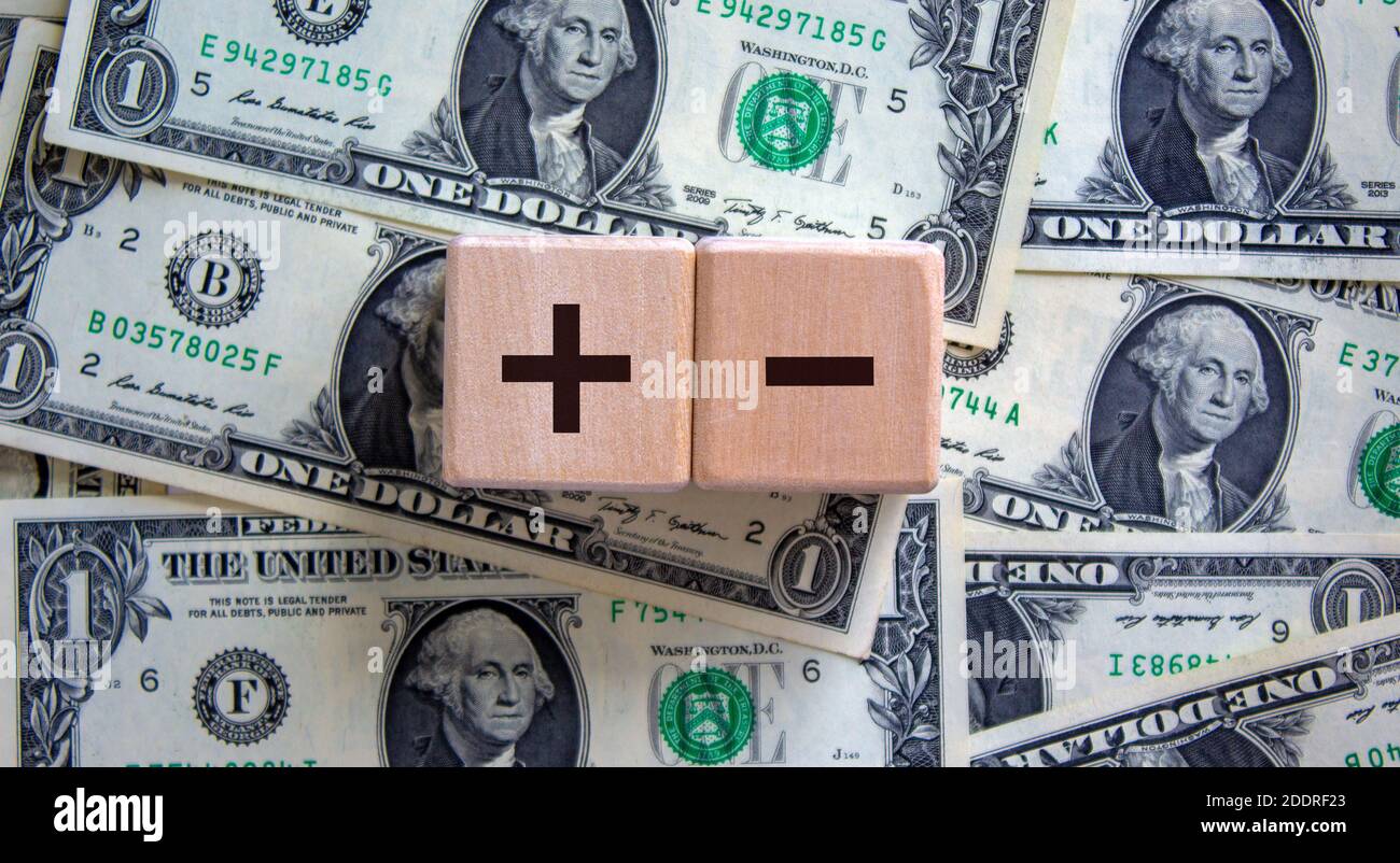 Plus or minus. Wooden cubes with plus and minus icon. Beautiful ...