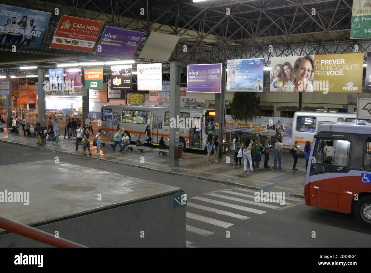 Bus stop, panoramic view, with passengers waiting for boarding, several ...