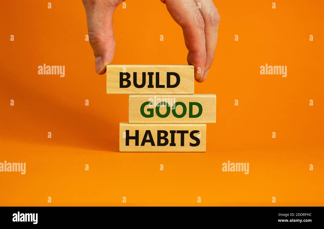 Time to build good habits. Wooden blocks with words 'build good habits ...